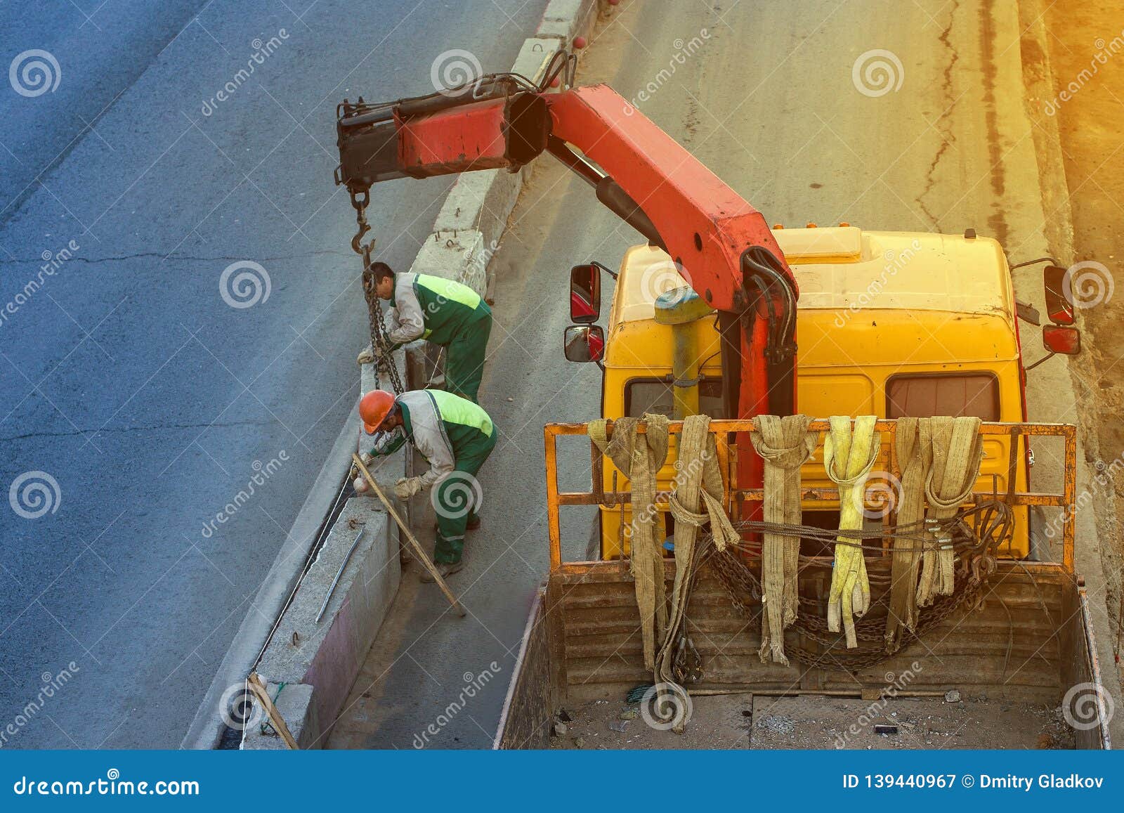 Workers Install Concrete Fence Along the Road Editorial Photography ...