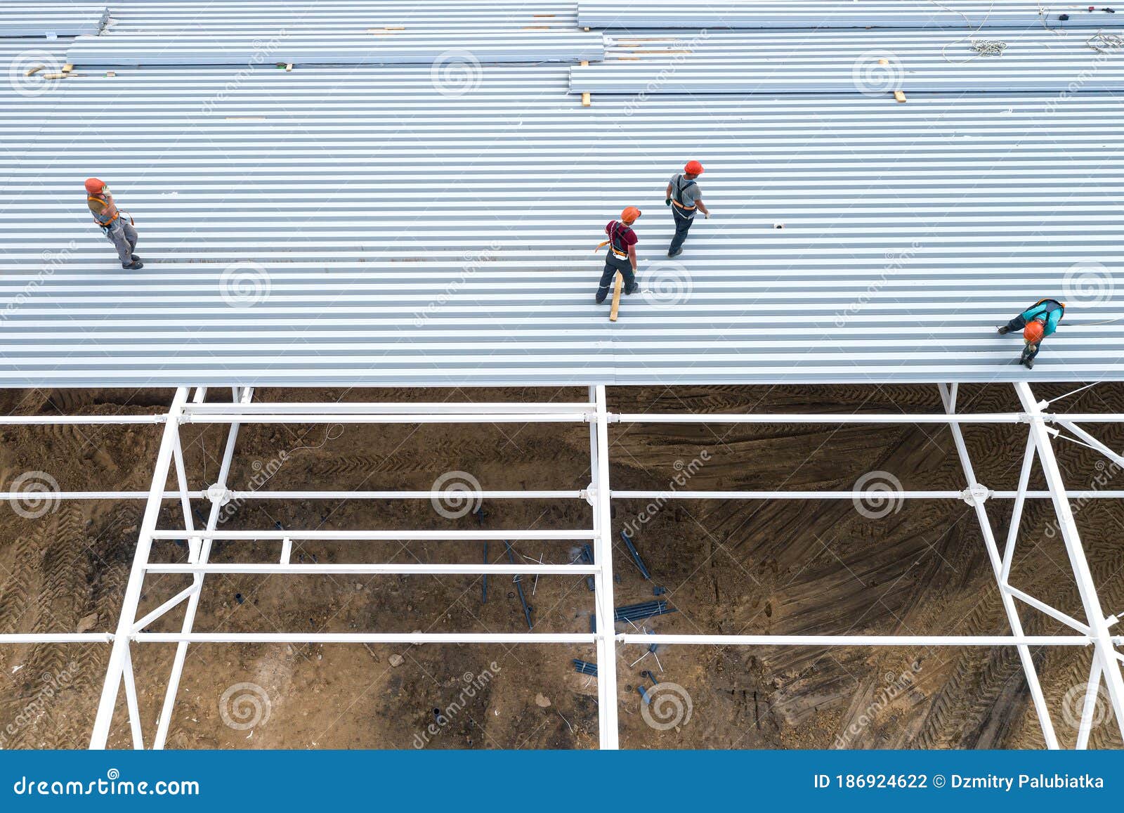 Workers Install the Roof of a Modern Frame Building. Top View from a ...