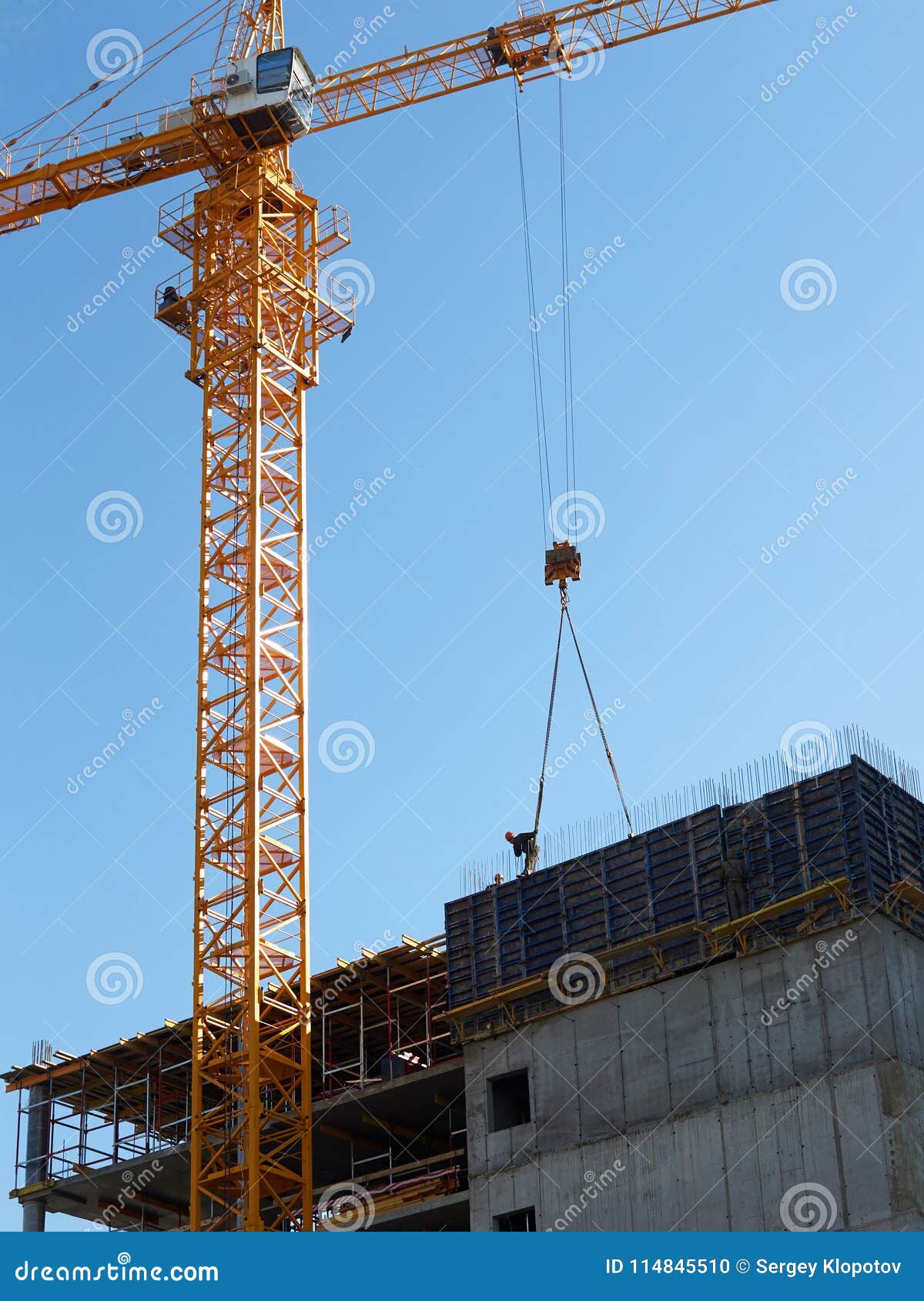 Workers Install Shields for Pouring Concrete in the Construction ...