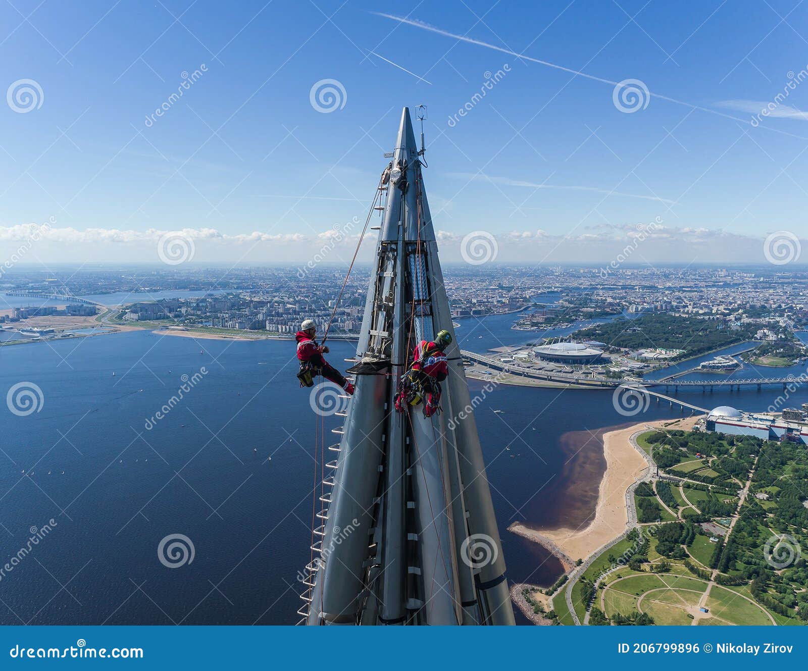 Workers Installers at the Height Work at the Top of Skyscraper Stock ...