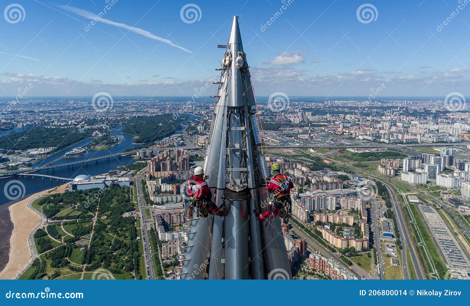 Workers Installers at the Height Work at the Top of Skyscraper Stock ...