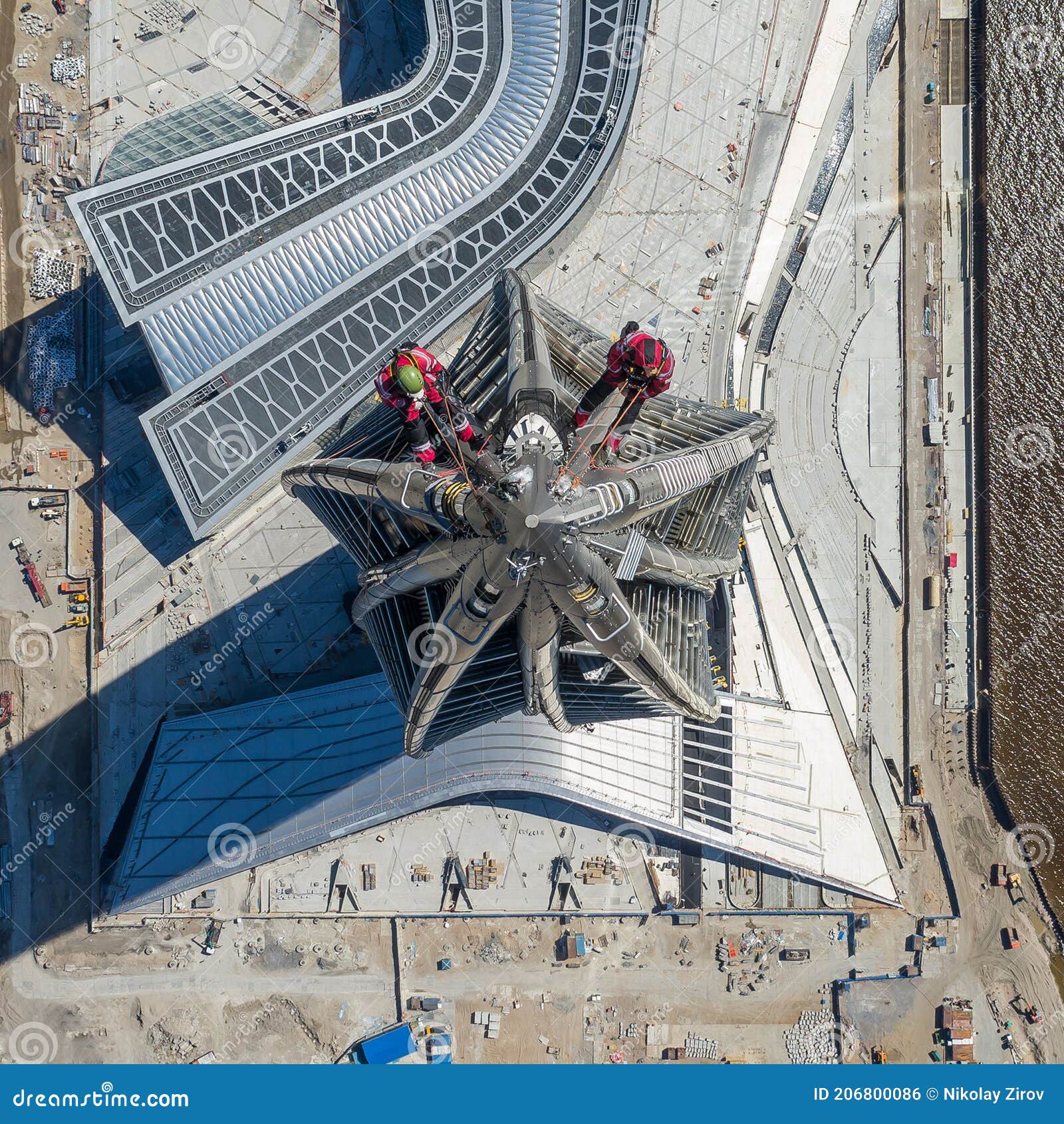 Workers Installers at the Height Work at the Top of Skyscraper Stock ...