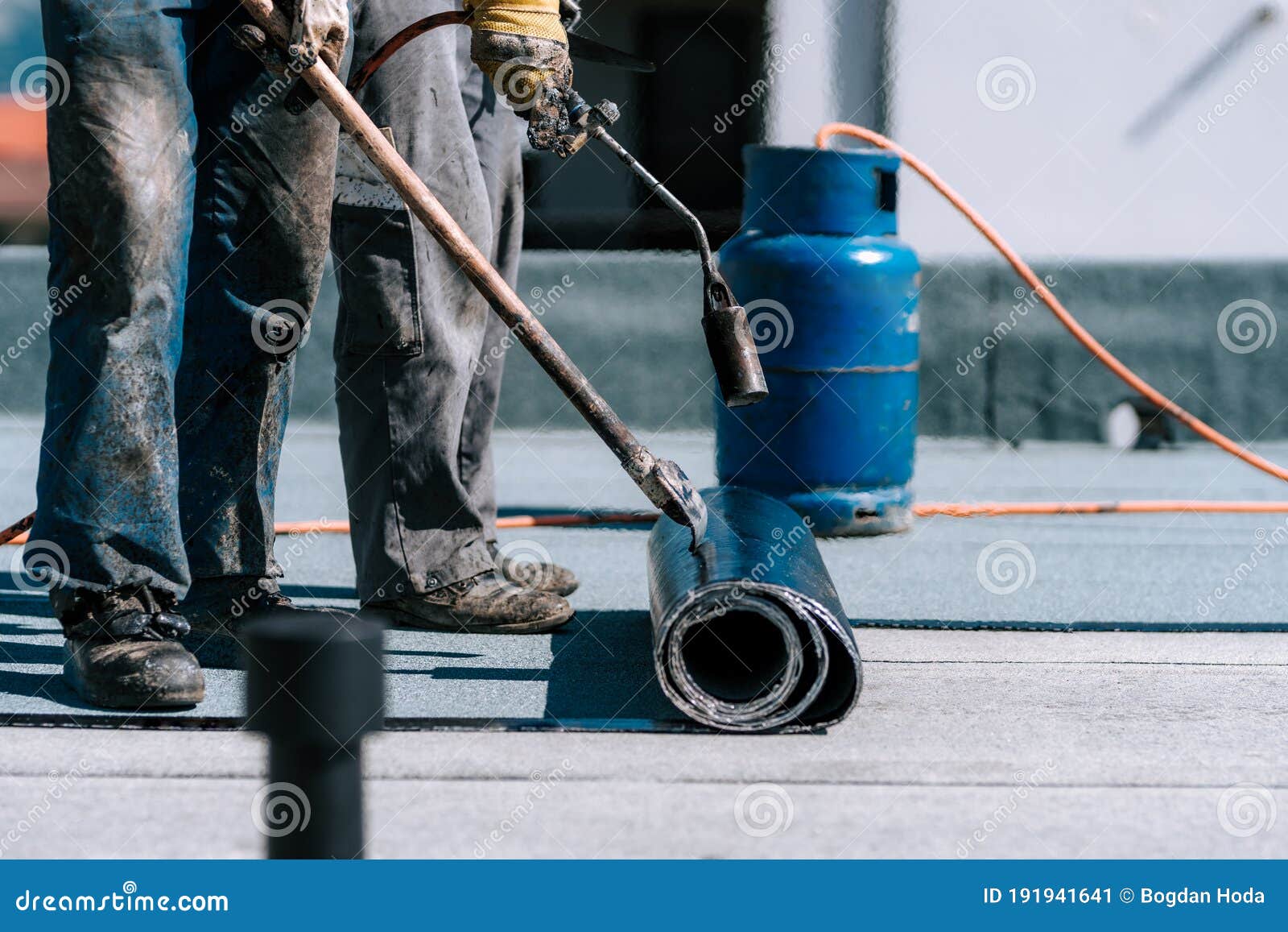 Workers Installing Bituminous Membrane Waterproofing System Insulation ...