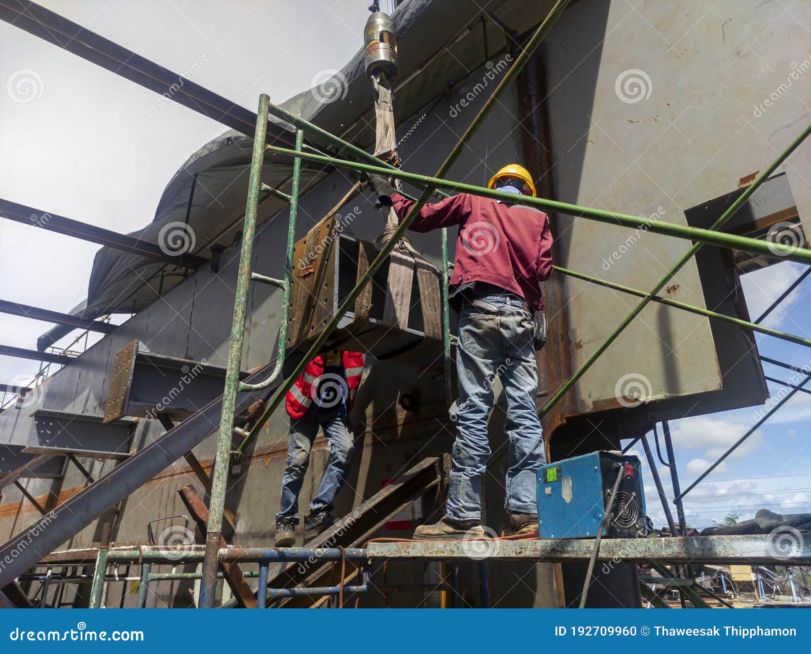 Workers are Installing Bracing Steel Beam of Steel Structure Work at ...