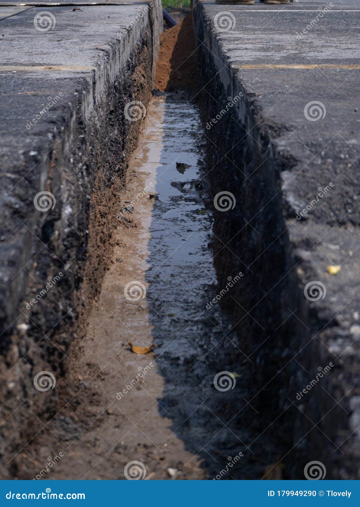 Workers are Installing Concrete Drains on the Side of the Road Stock ...