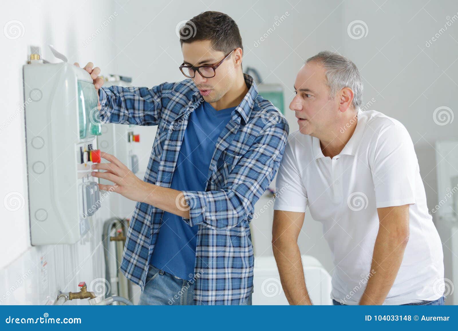 Workers Installing Device on Wall Stock Photo - Image of device, hand ...