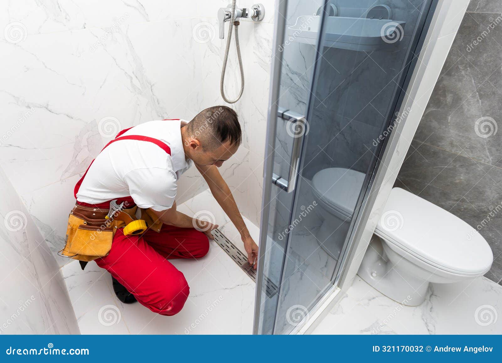 Workers are Installing Glass Door of the Shower Enclosure. Stock Photo ...