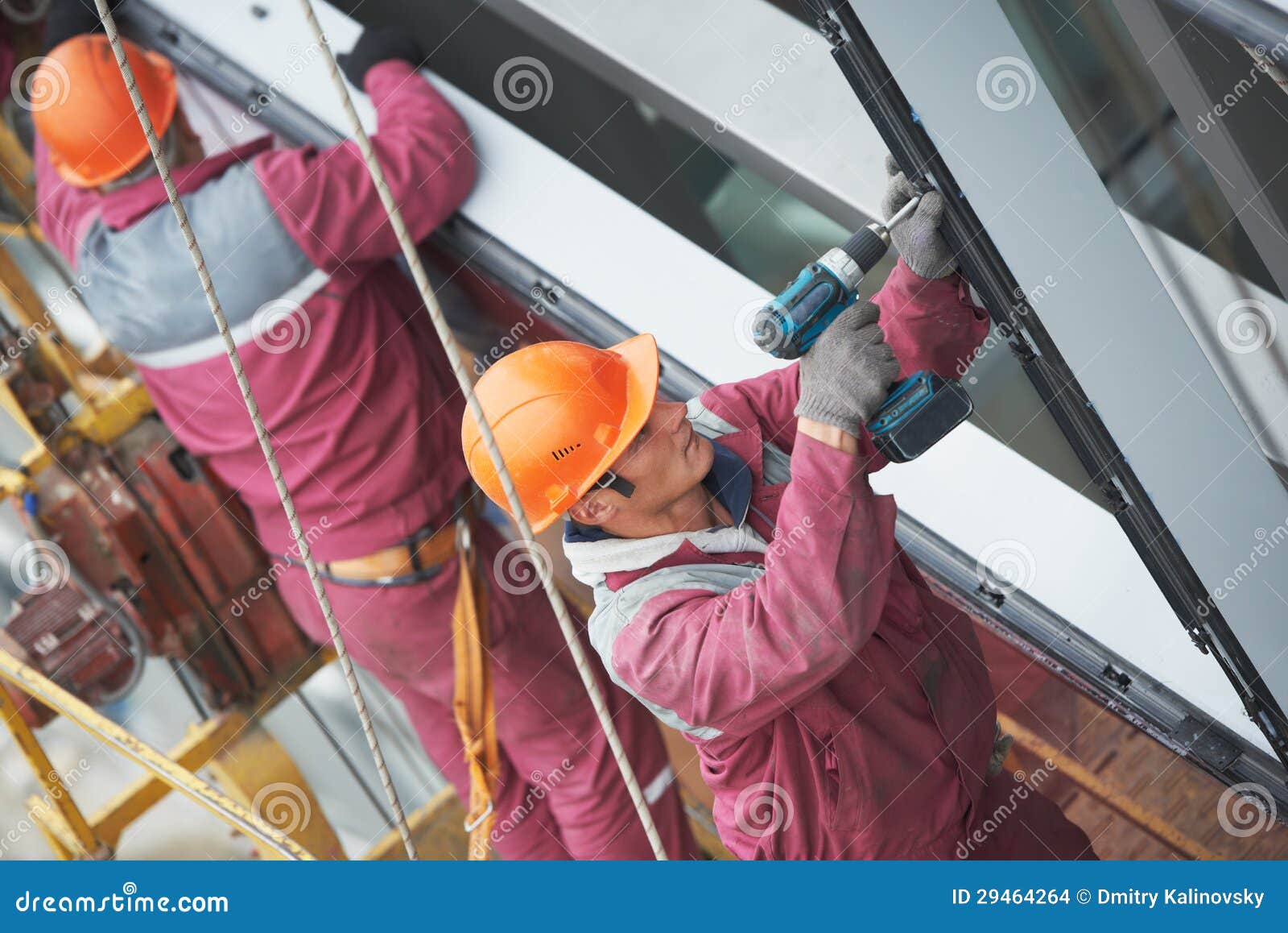 Workers Installing Glass Window on Building Stock Photo - Image of ...