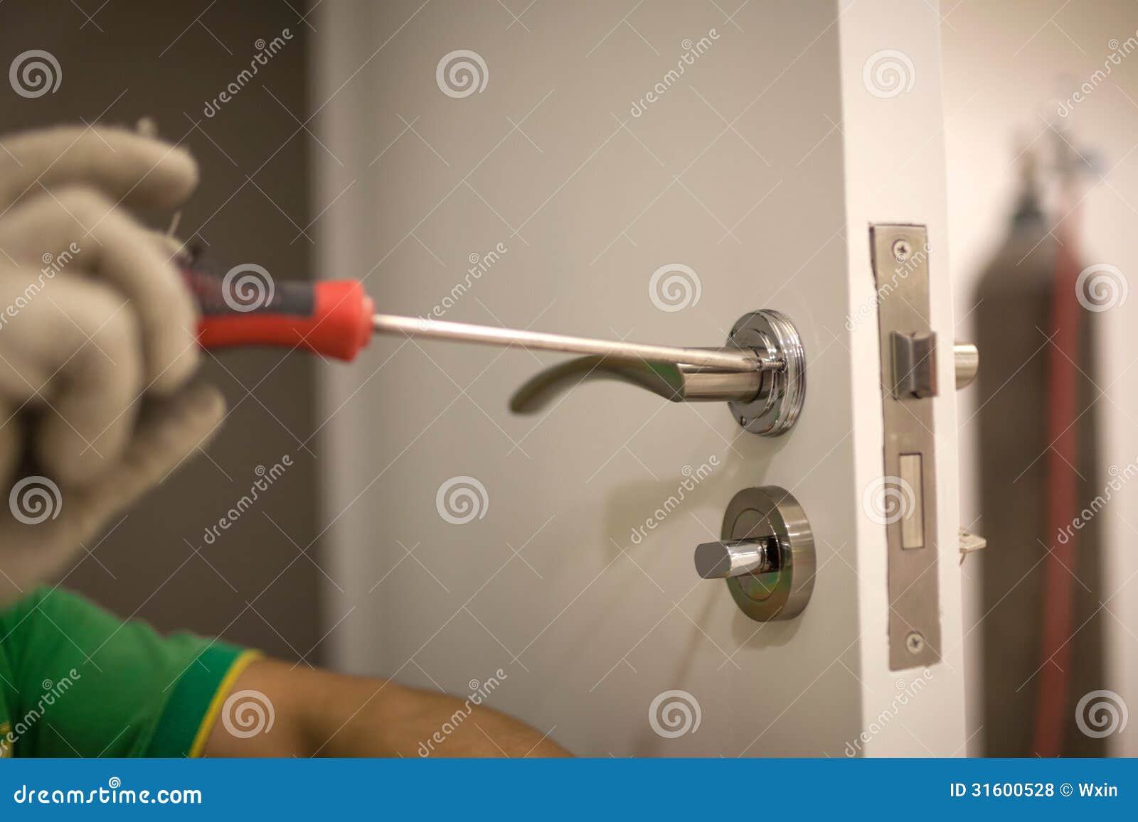 Workers installing locks stock photo. Image of male, tradesperson ...