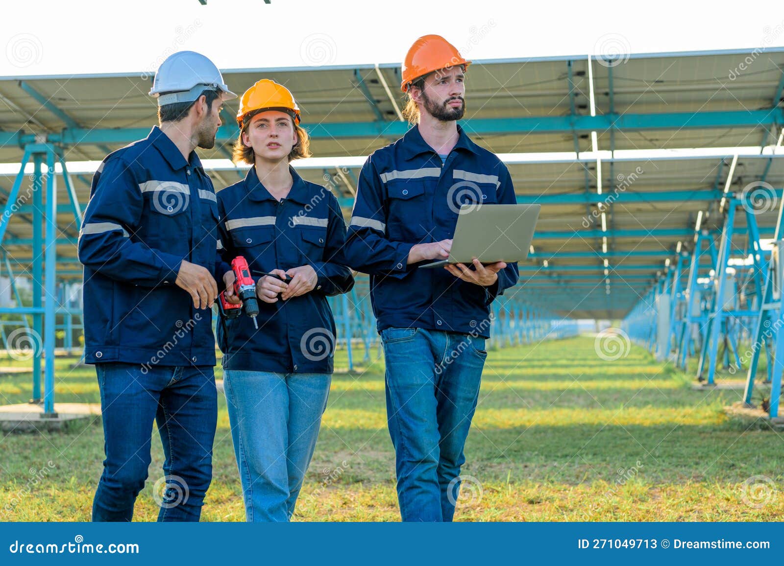 Workers Installing Solar Panels, Engineer Team at Solar Panel Farm ...