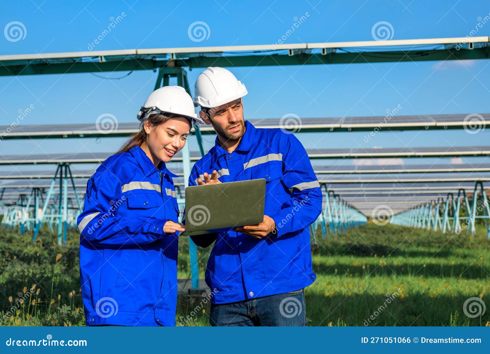 Workers Installing Solar Panels, Engineer Team at Solar Panel Farm ...