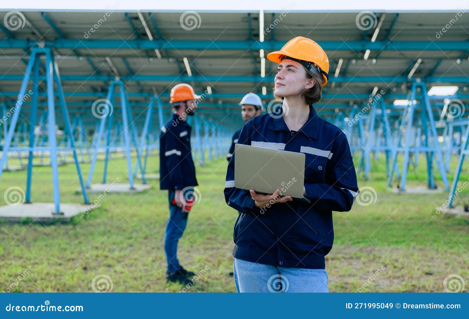 Workers Installing Solar Panels, Engineer Team at Solar Panel Farm ...