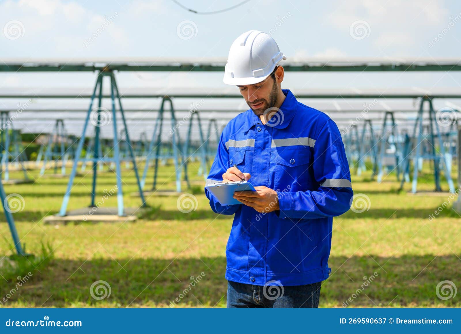 Workers Installing Solar Panels, Engineer Team at Solar Panel Farm ...