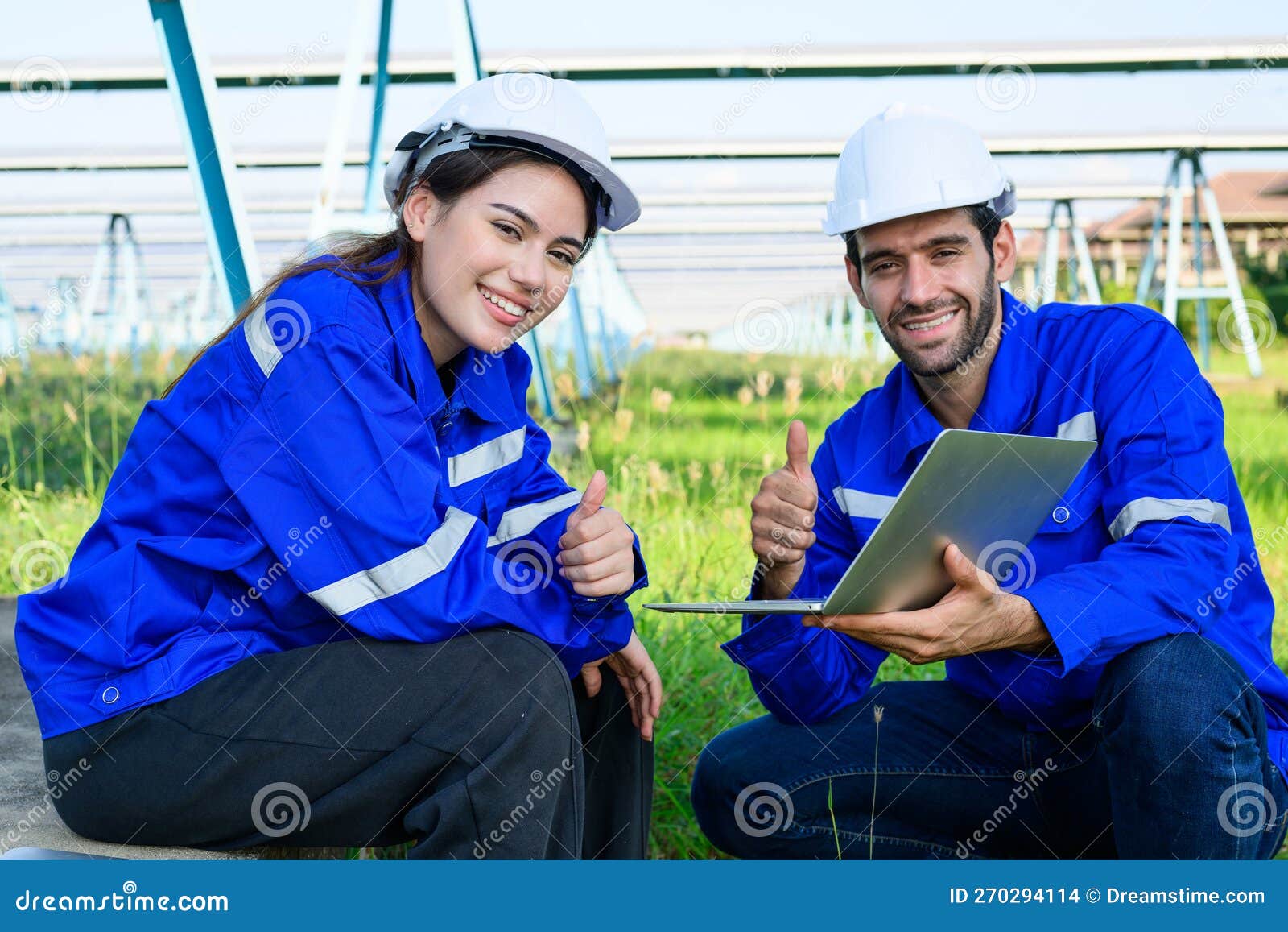 Workers Installing Solar Panels, Engineer Team at Solar Panel Farm ...