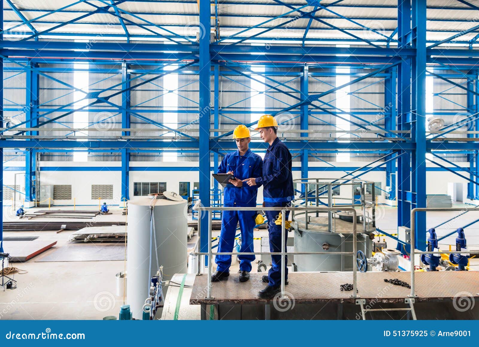 Workers in Large Metal Workshop Checking Work Stock Image - Image of ...