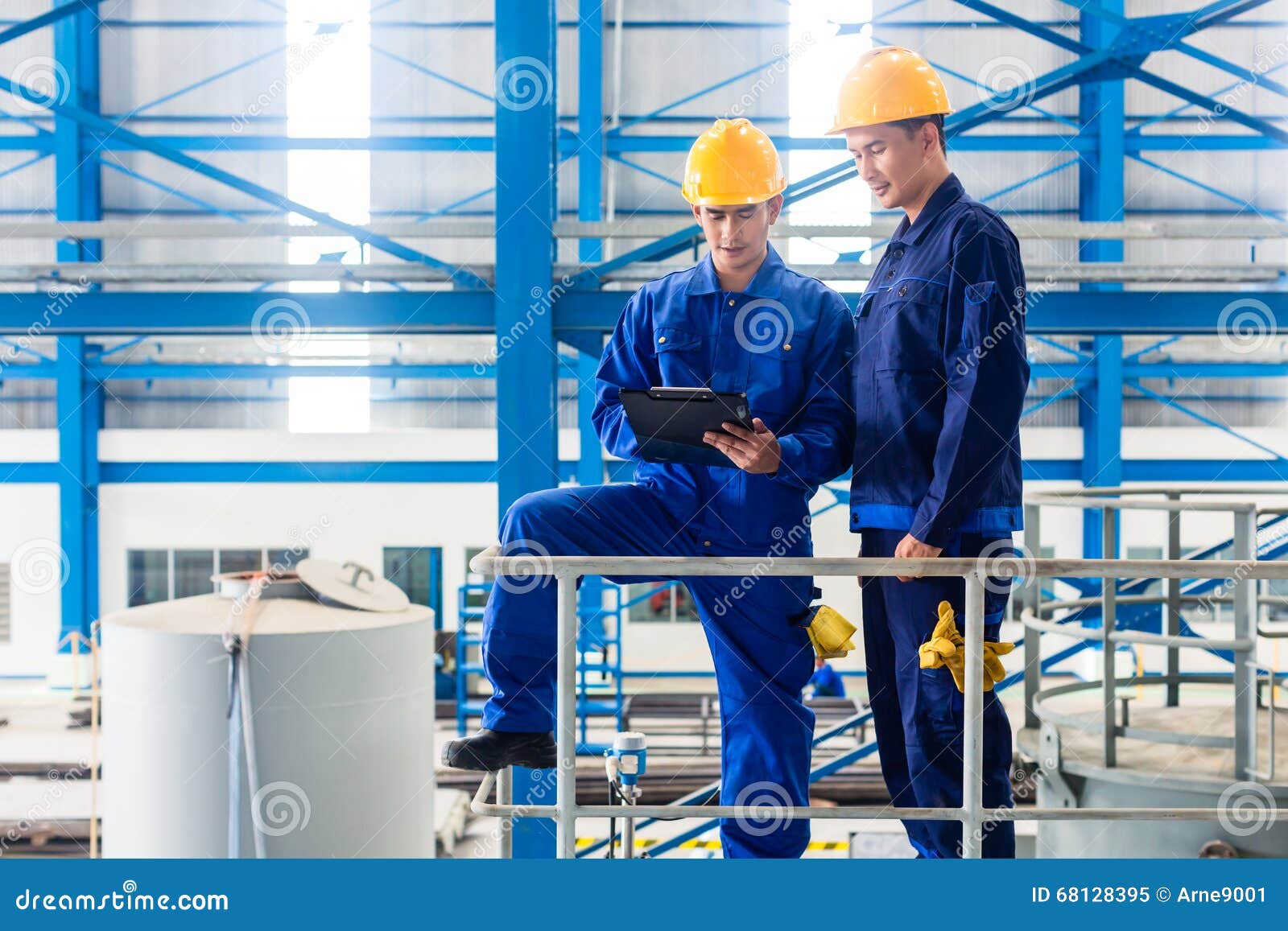 Workers in Large Metal Workshop Checking Work Stock Image - Image of ...