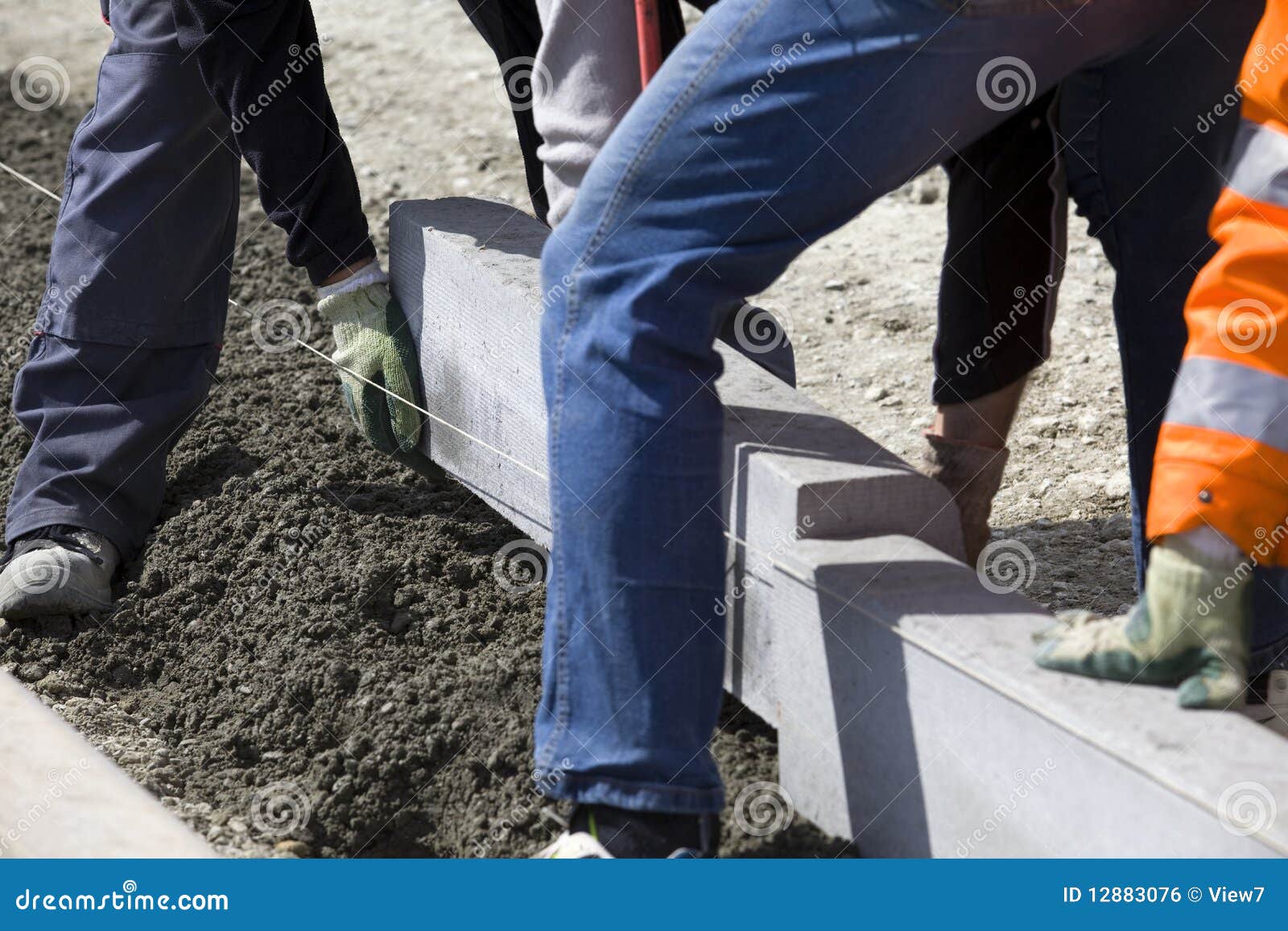 Workers Laying Granite Block Paver In Place. Stock Photography ...