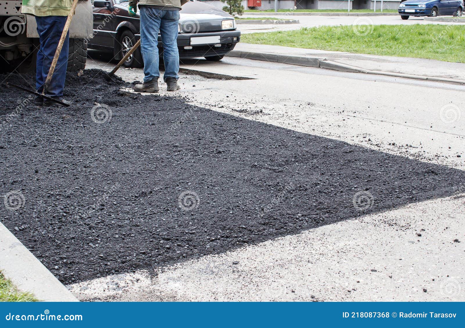 Workers Laying Hot Asphalt on the Road Surface Stock Photo - Image of ...