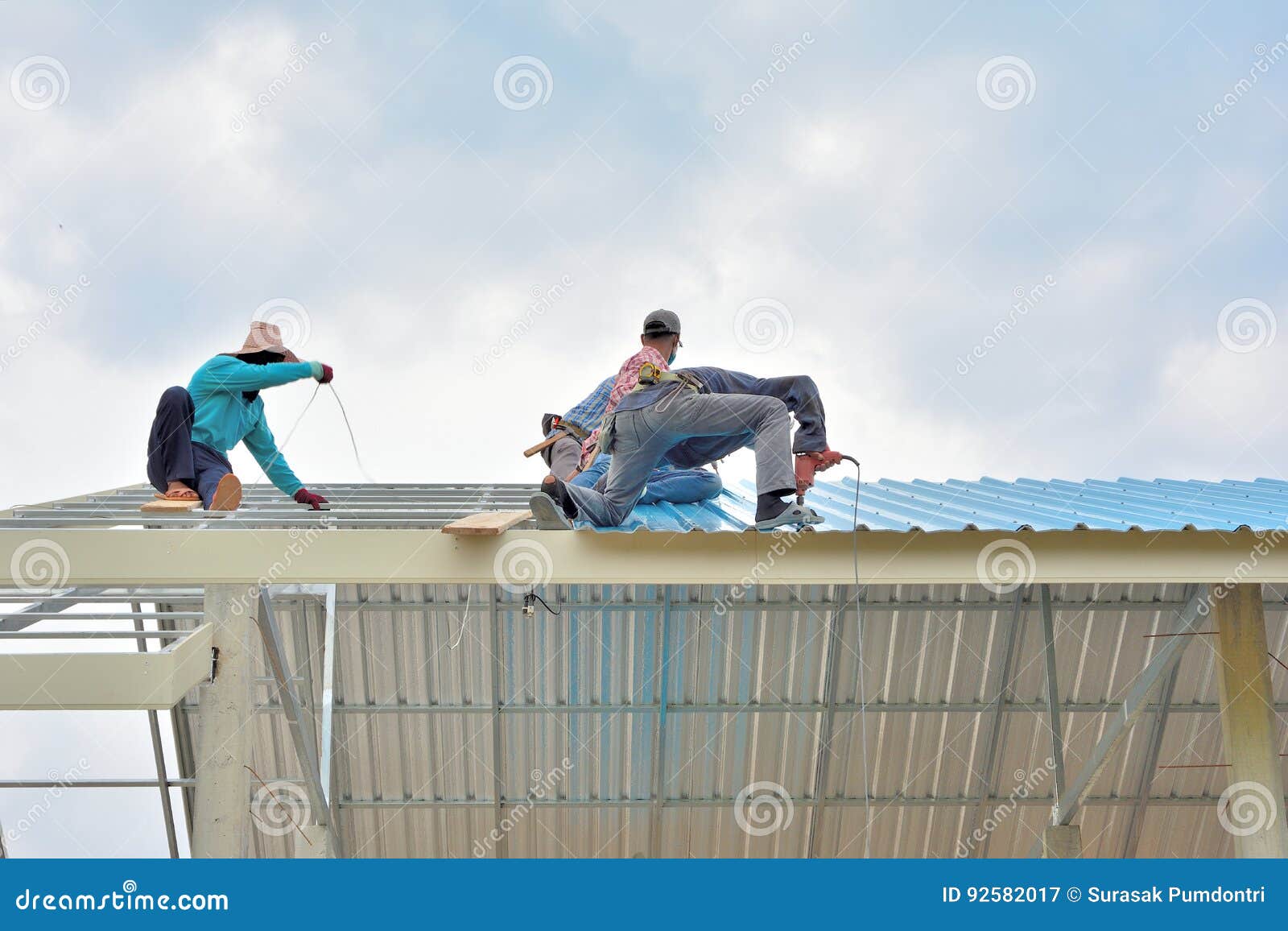 Workers are Laying Roof on Steel Frame. Editorial Photography - Image ...