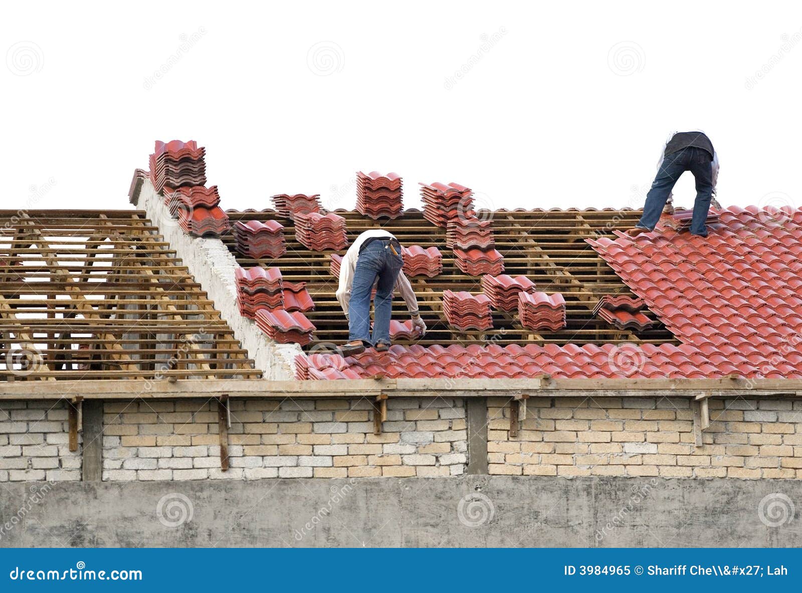 Workers Laying Roof Tiles stock image. Image of laying - 3984965
