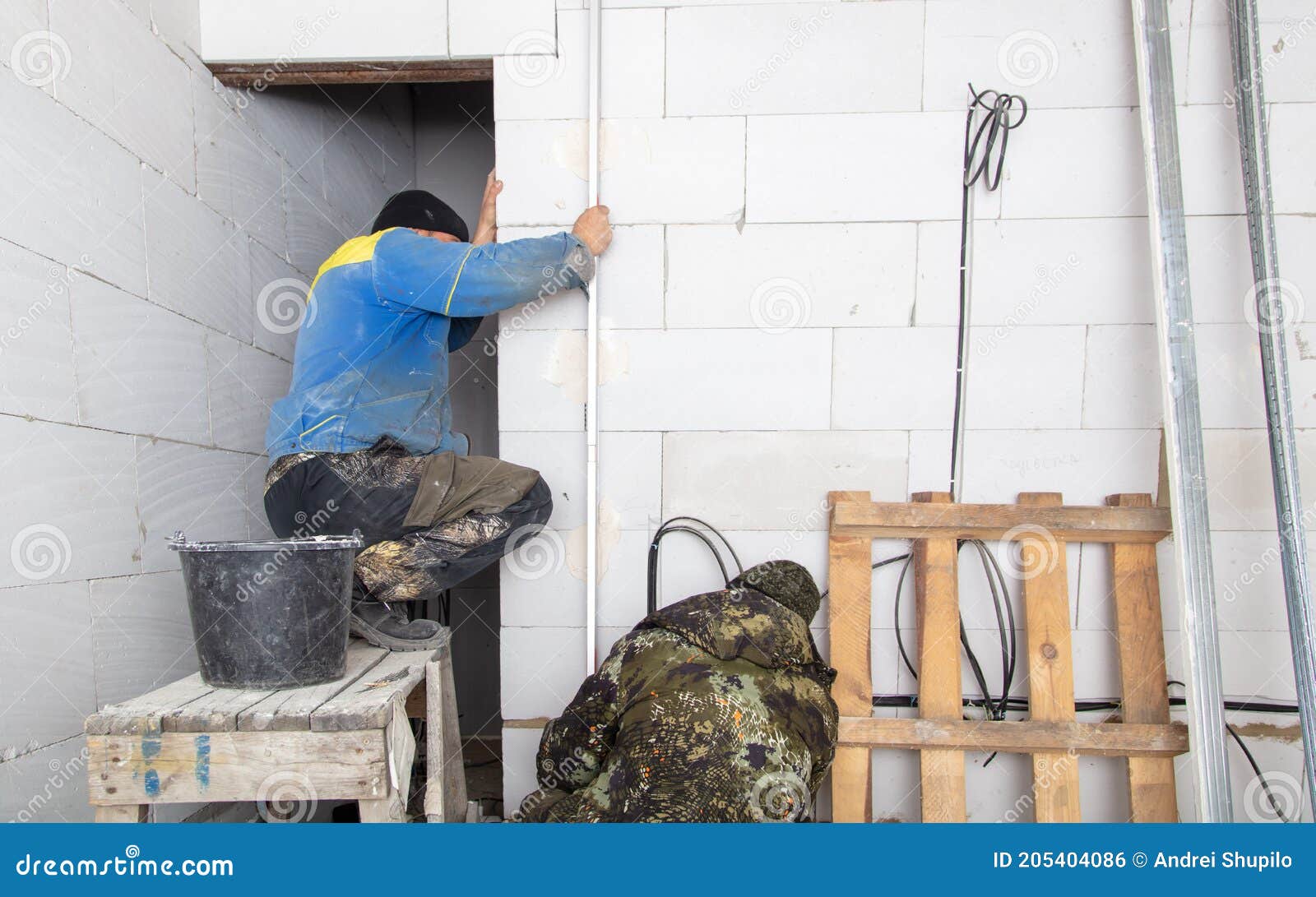 Workers Level and Plaster the Walls Stock Photo - Image of cement ...