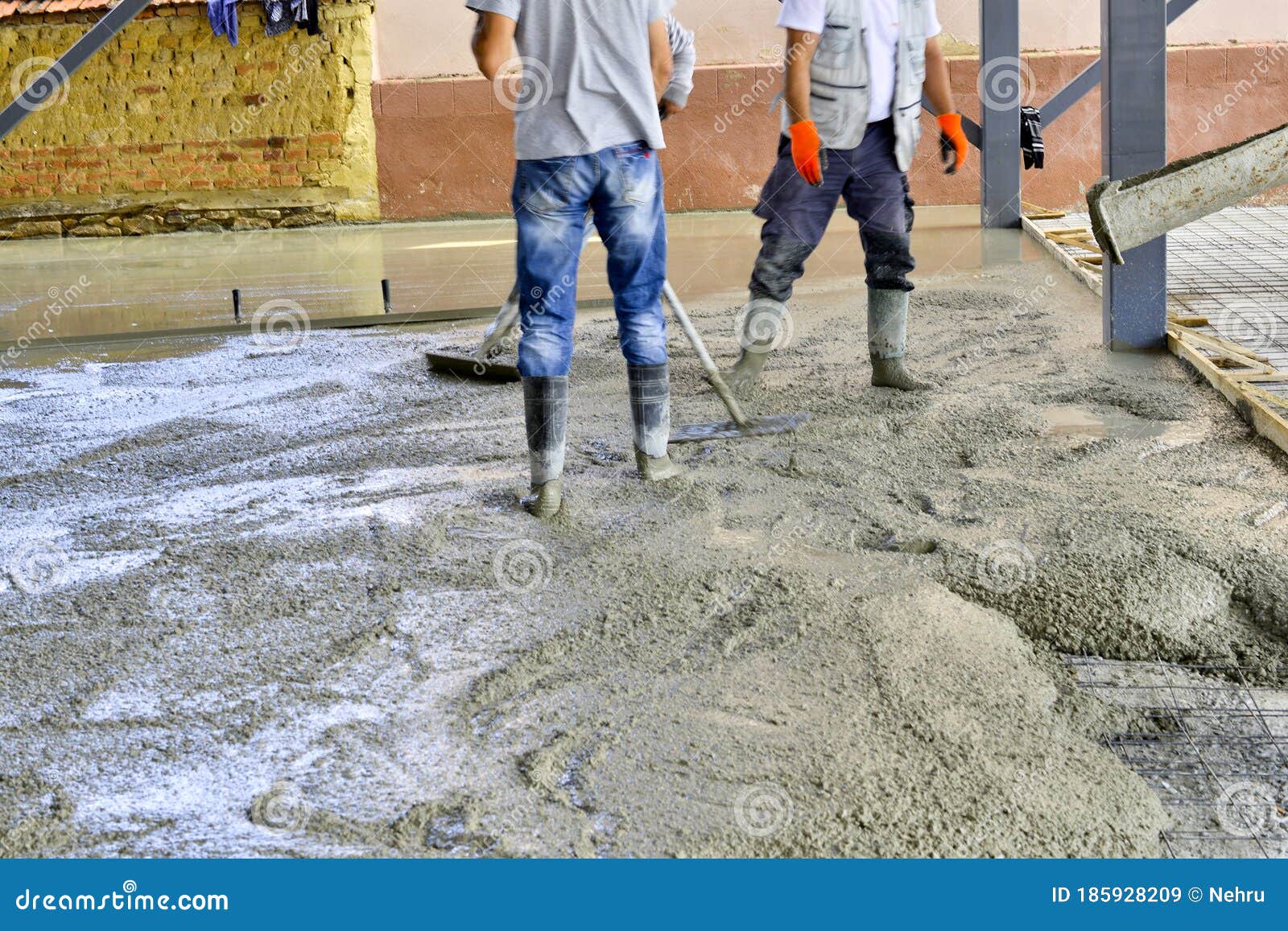 Workers Leveling Concrete of a New Building Stock Image - Image of ...