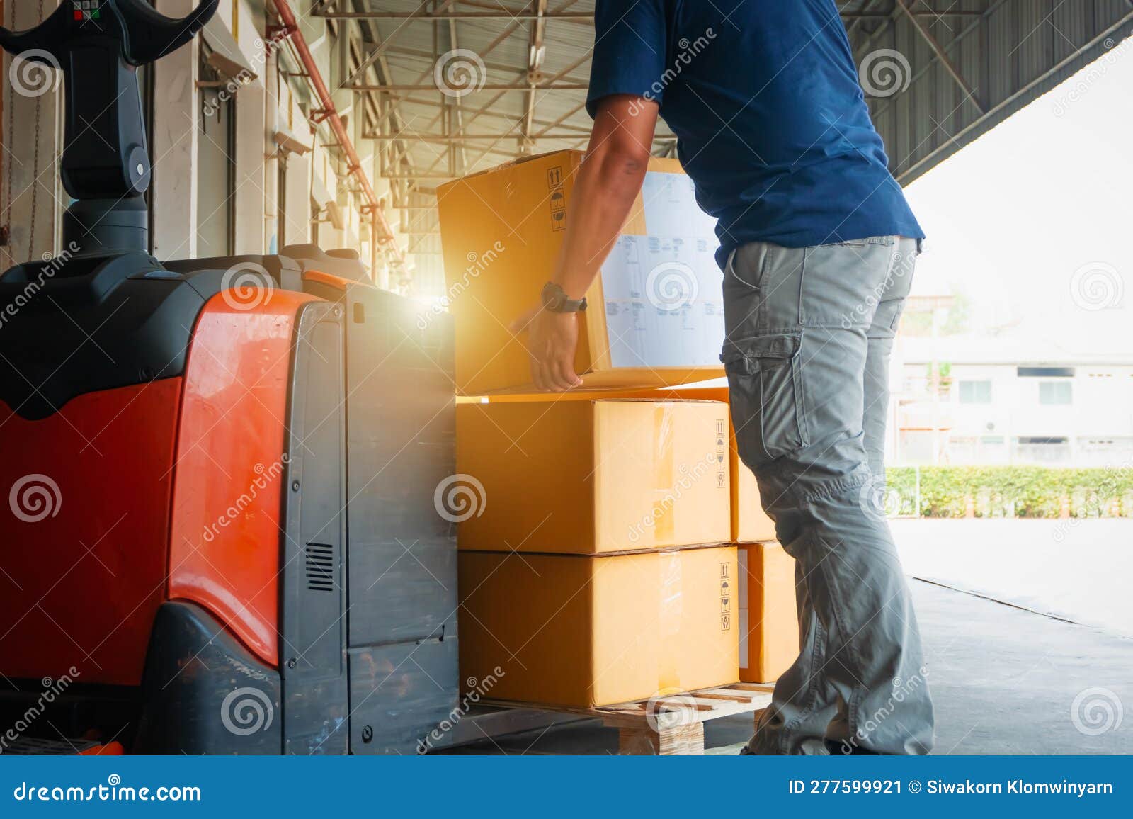 Workers Lifting Package Boxes Stacking on Pallet. Cartons, Cardboard ...
