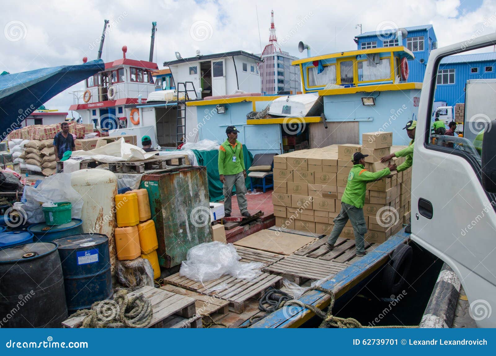 Workers Loading Goods in Supply Boat Editorial Photo - Image of group ...