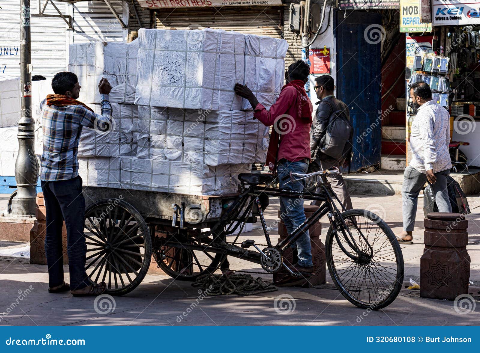 Workers Loading Heavy Cargo Onto Bicycle Cart Editorial Stock Photo ...