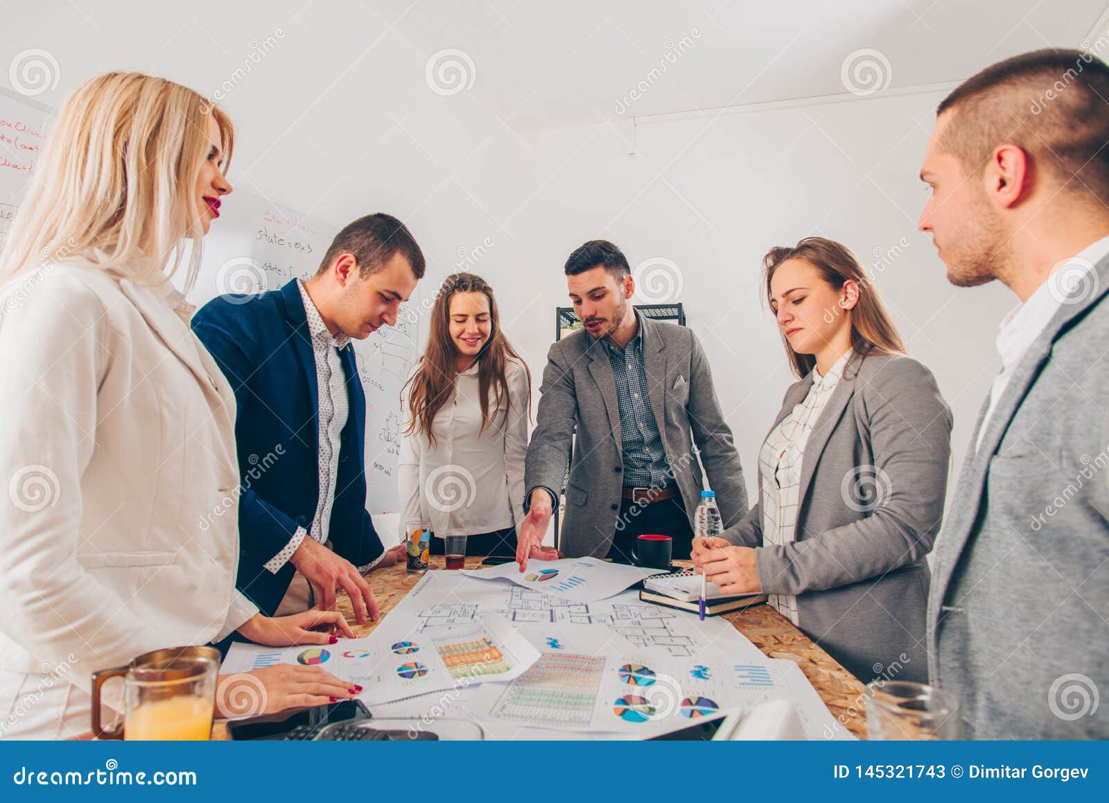 Workers Looking at the Diagram Stock Image - Image of businessman ...