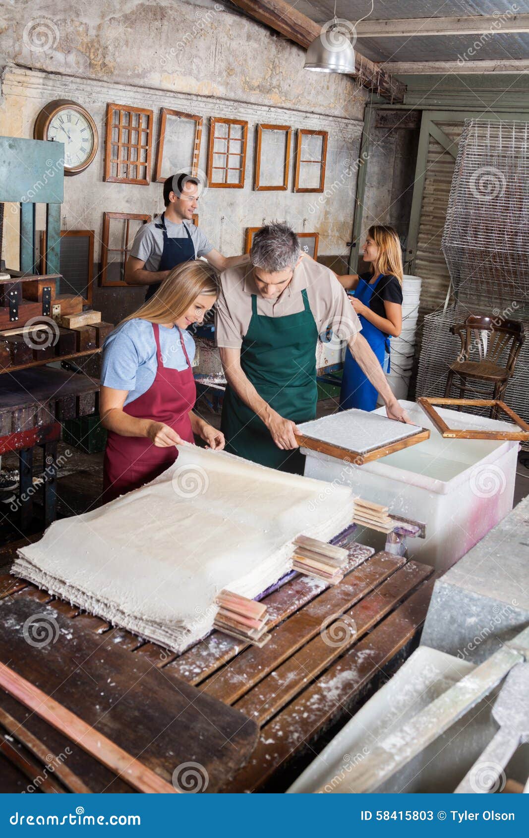 Workers Looking at Drying Papers in Factory Stock Image - Image of ...