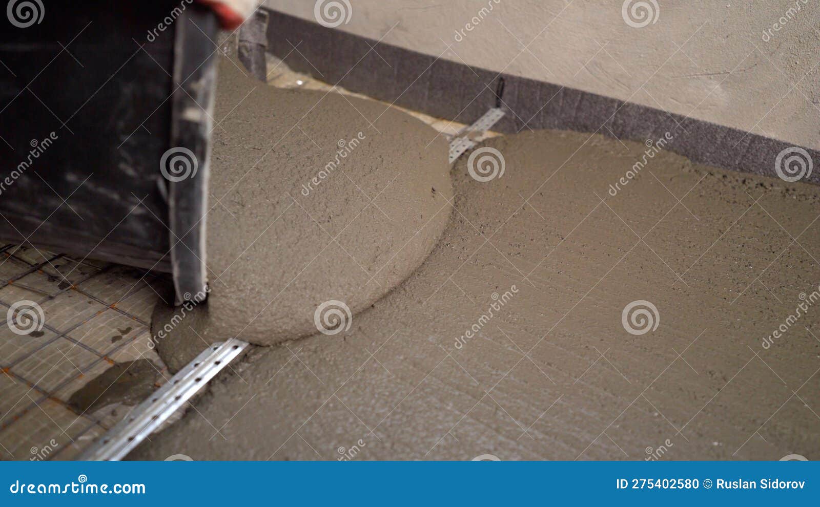 Professional Floor Screed. Workers Pour Mortar Onto the Floor To Level ...