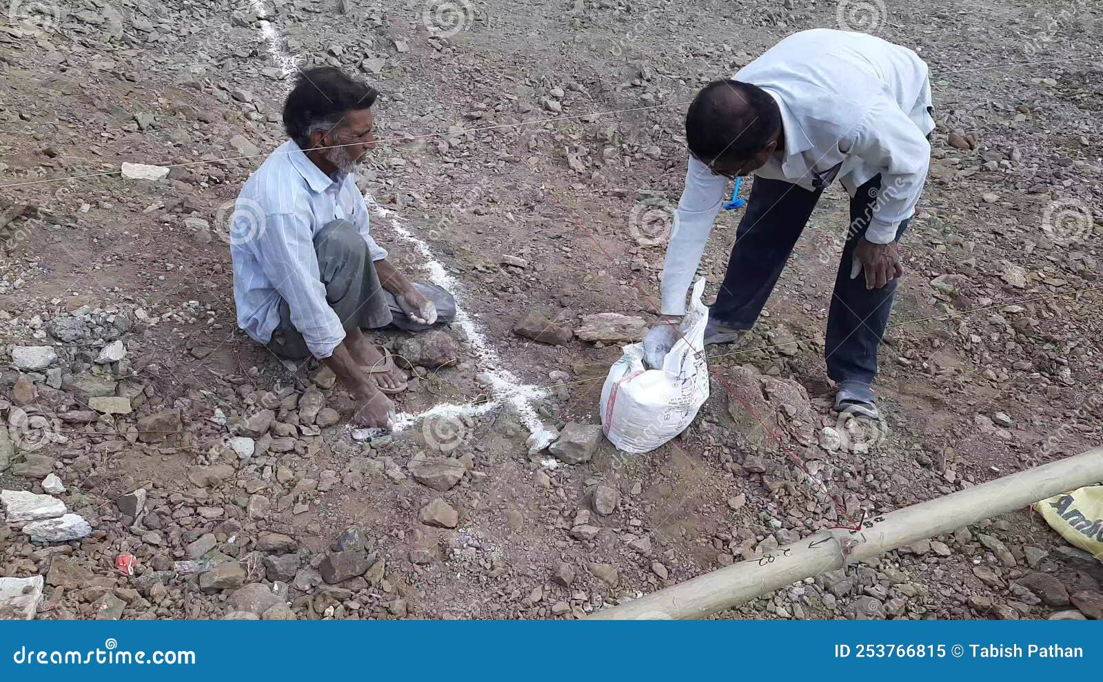 Workers Mark the Ground Floor Layout Column with White Cement - Layout ...