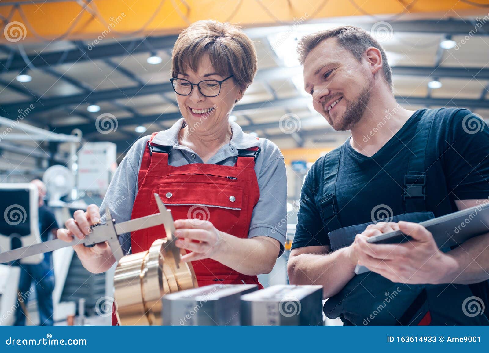 Workers Measuring a Metal Workpiece Stock Image - Image of laborer ...