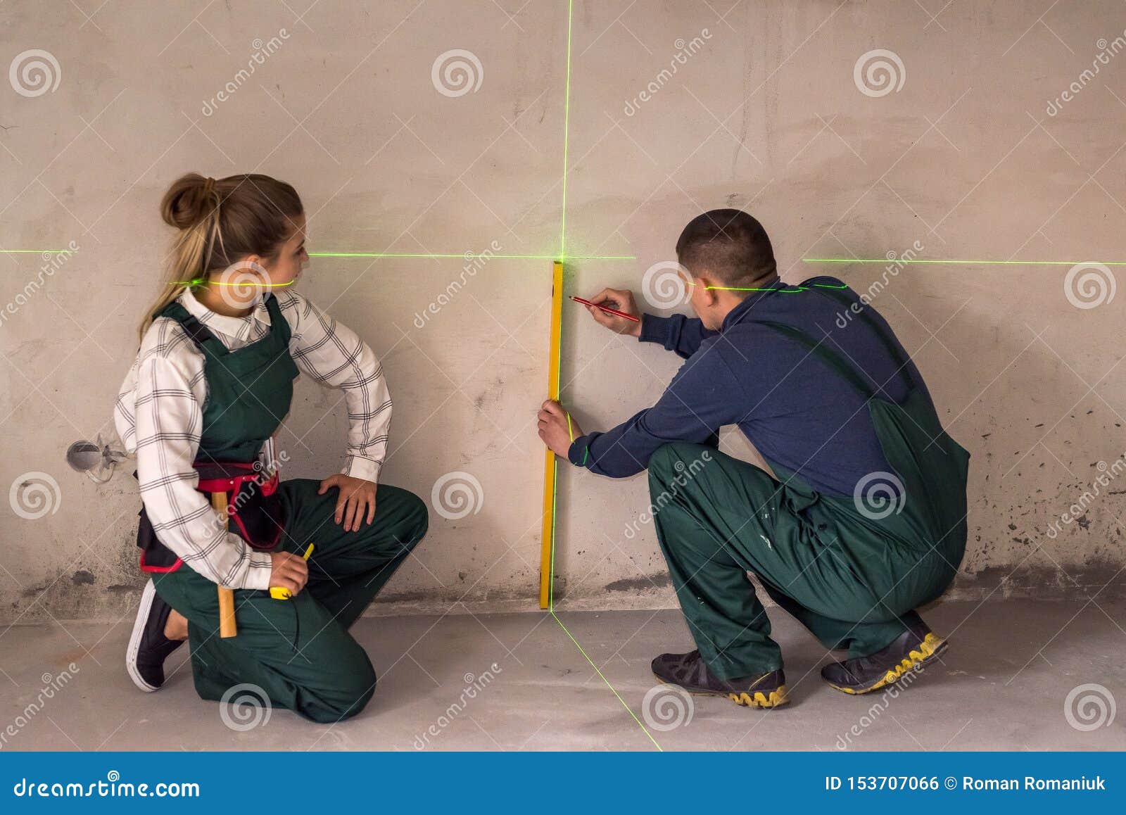 Workers Measuring Walls with Laser Level Tool Stock Photo - Image of ...