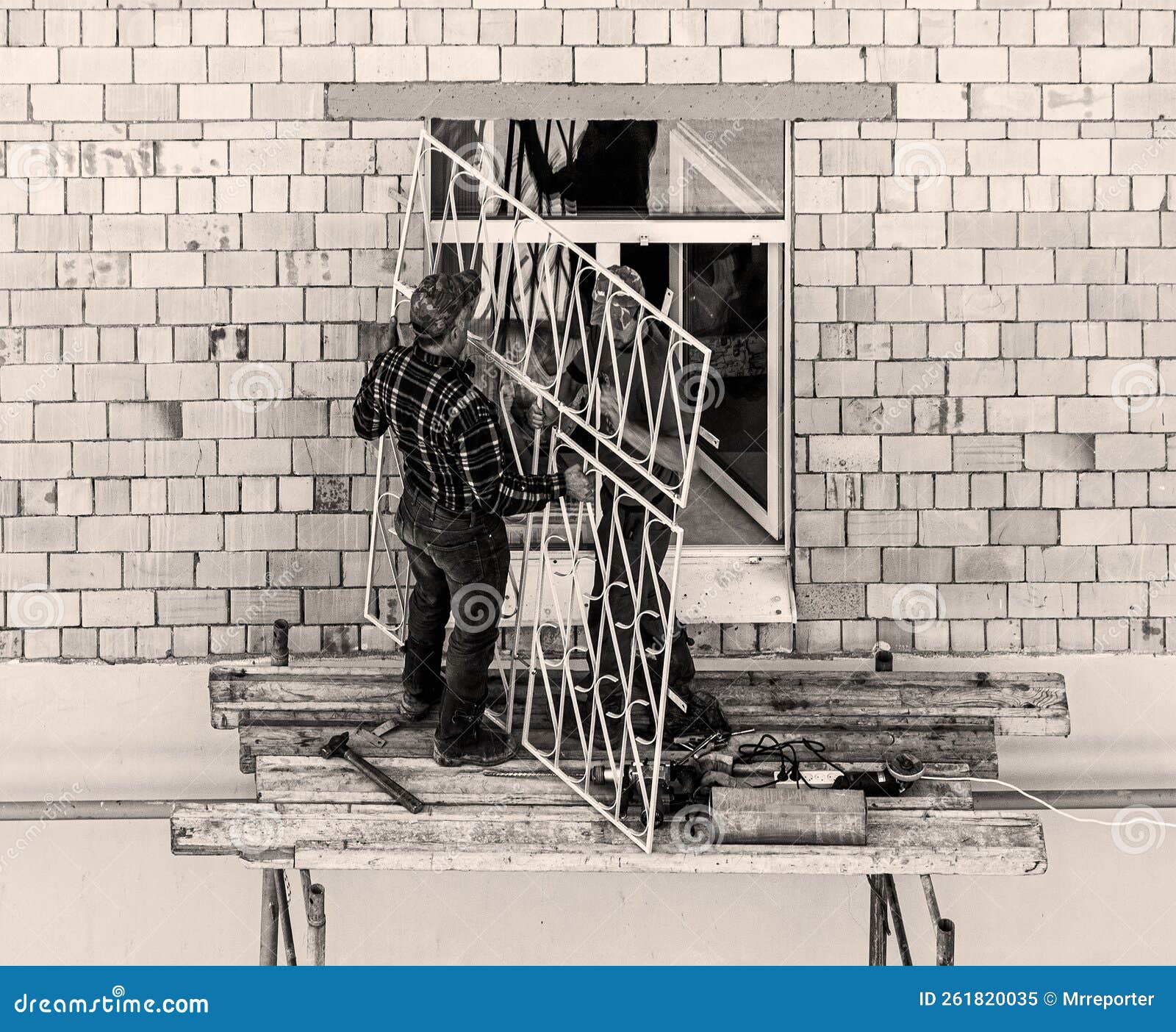 Workers Mounting the Window Grating Editorial Image - Image of grid ...
