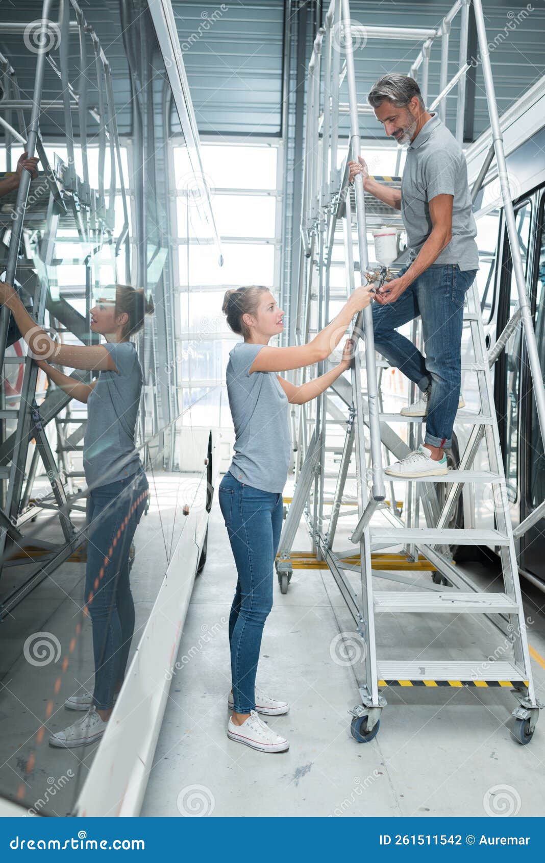 Workers Next To Aluminum Ladder at Warehouse Stock Photo - Image of ...