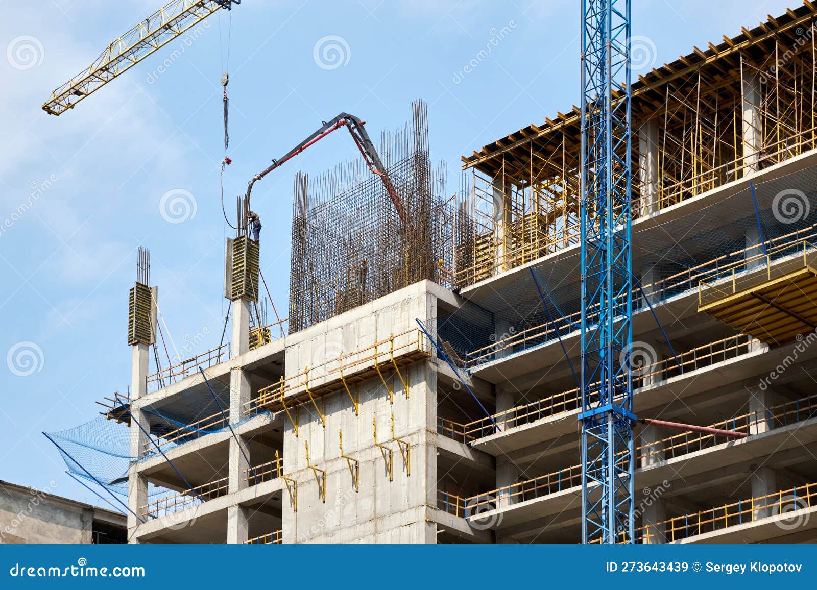Workers Pour Concrete at the Construction Site of a New Building Stock ...