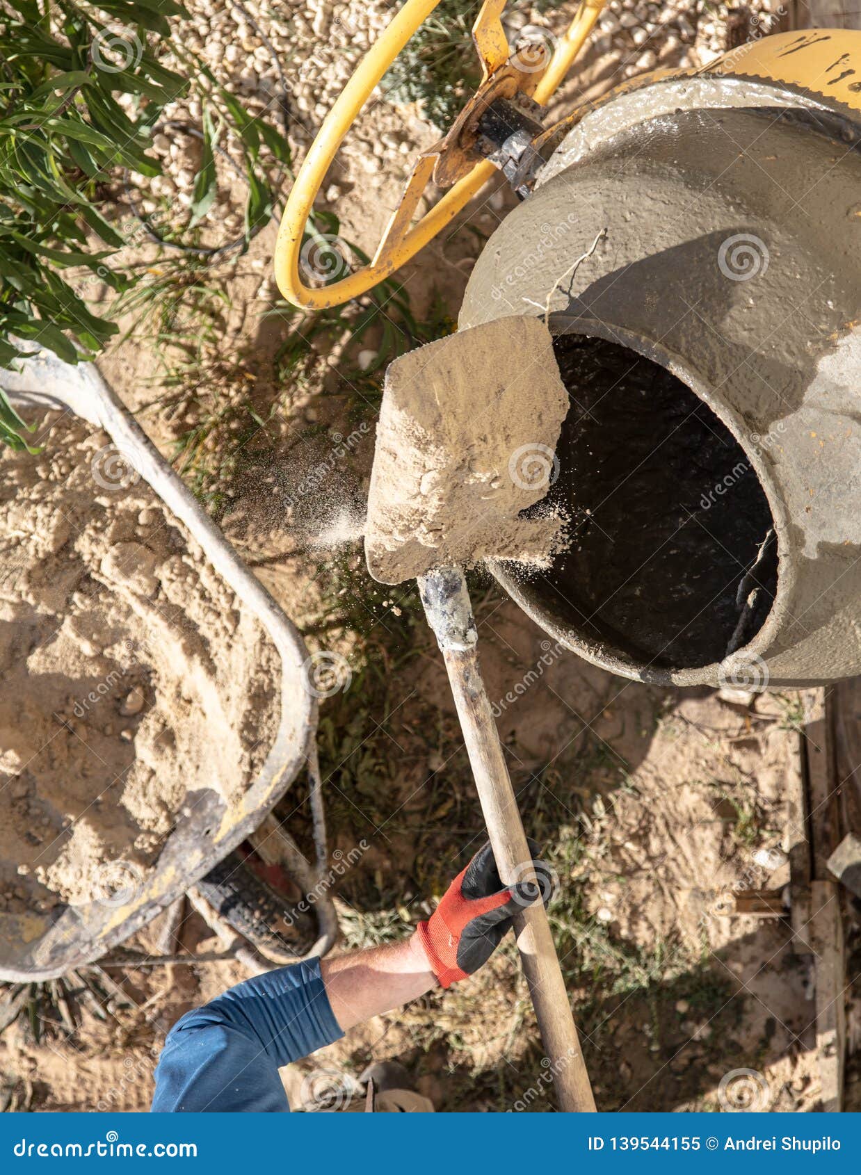 Workers Pour Concrete Solution at a Construction Site Stock Image ...