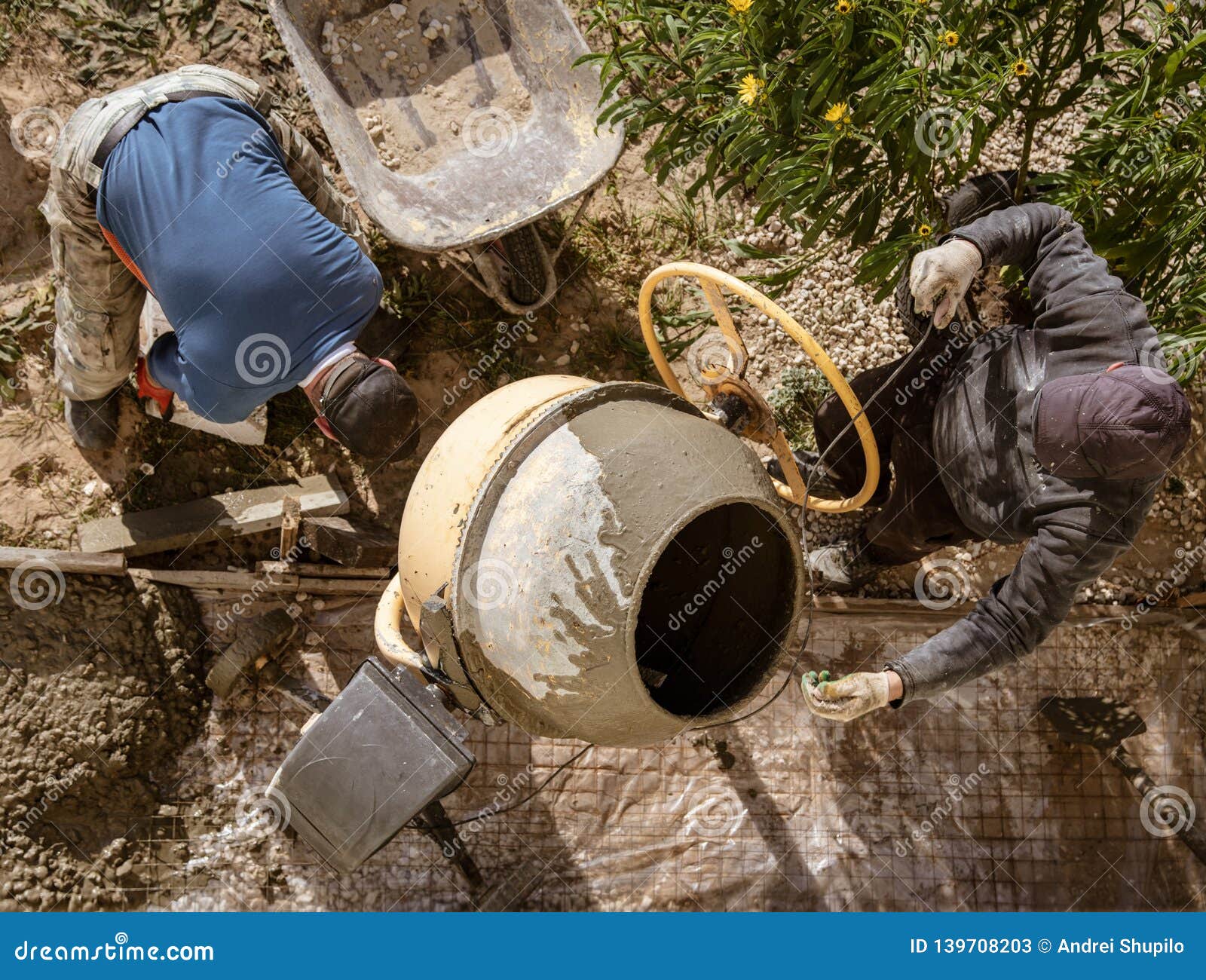 Workers Pour Concrete Solution at a Construction Site Stock Image ...