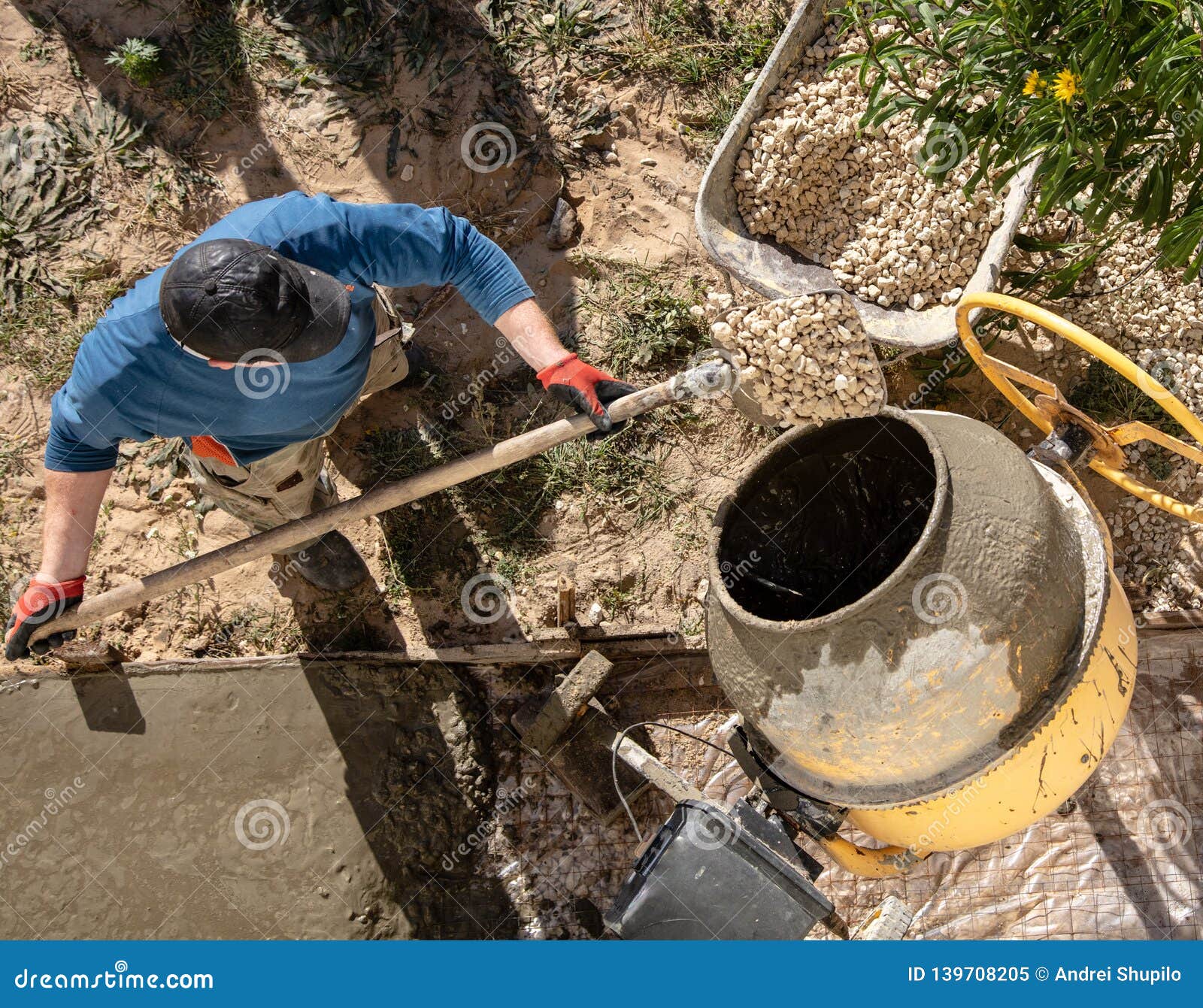 Workers Pour Concrete Solution at a Construction Site Stock Image ...