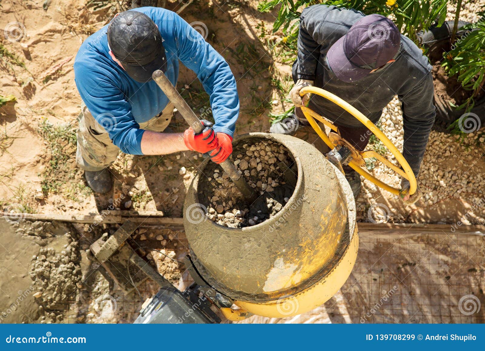 Workers Pour Concrete Solution at a Construction Site Stock Image ...