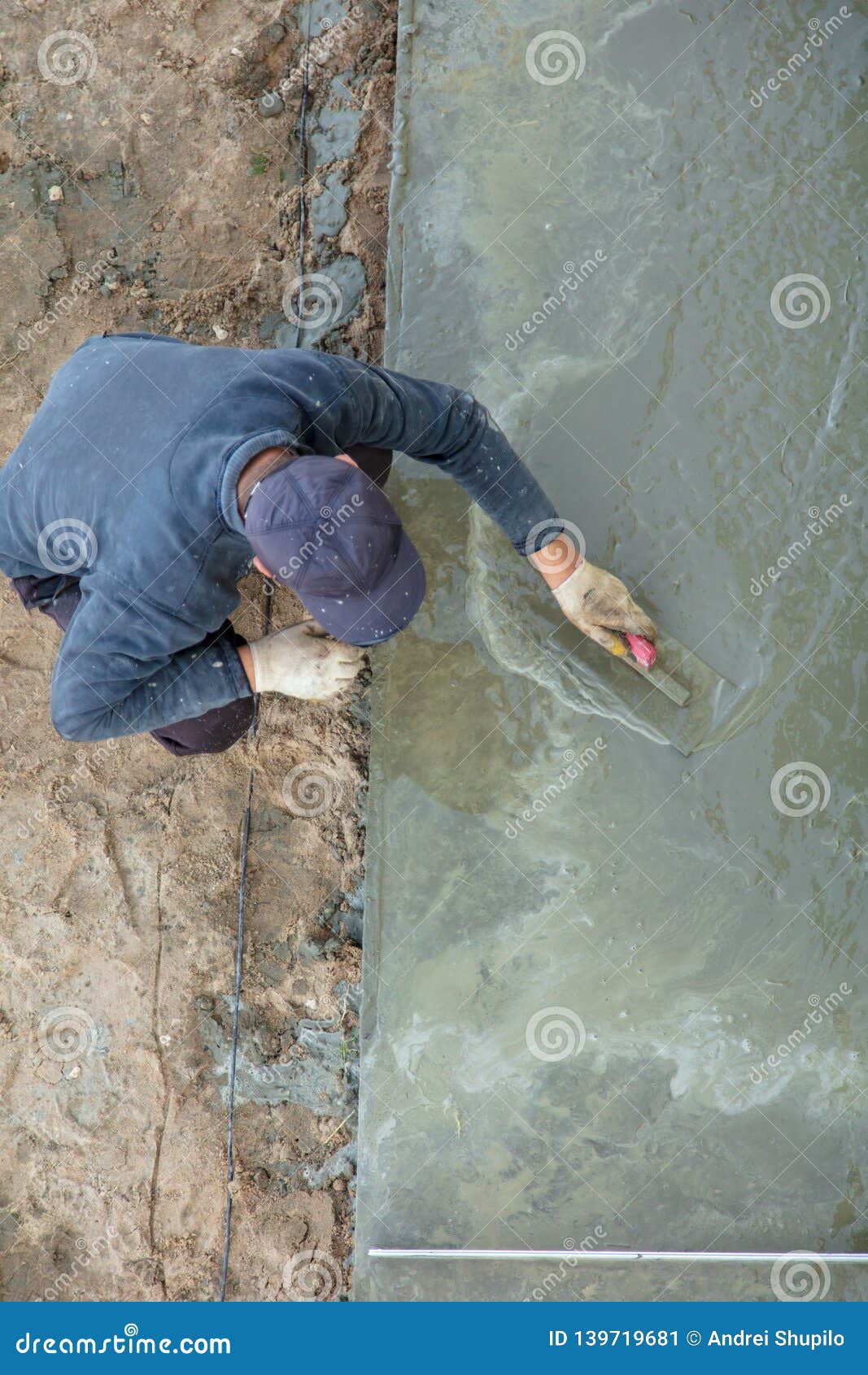 Workers Pour Concrete Solution at a Construction Site Stock Image ...