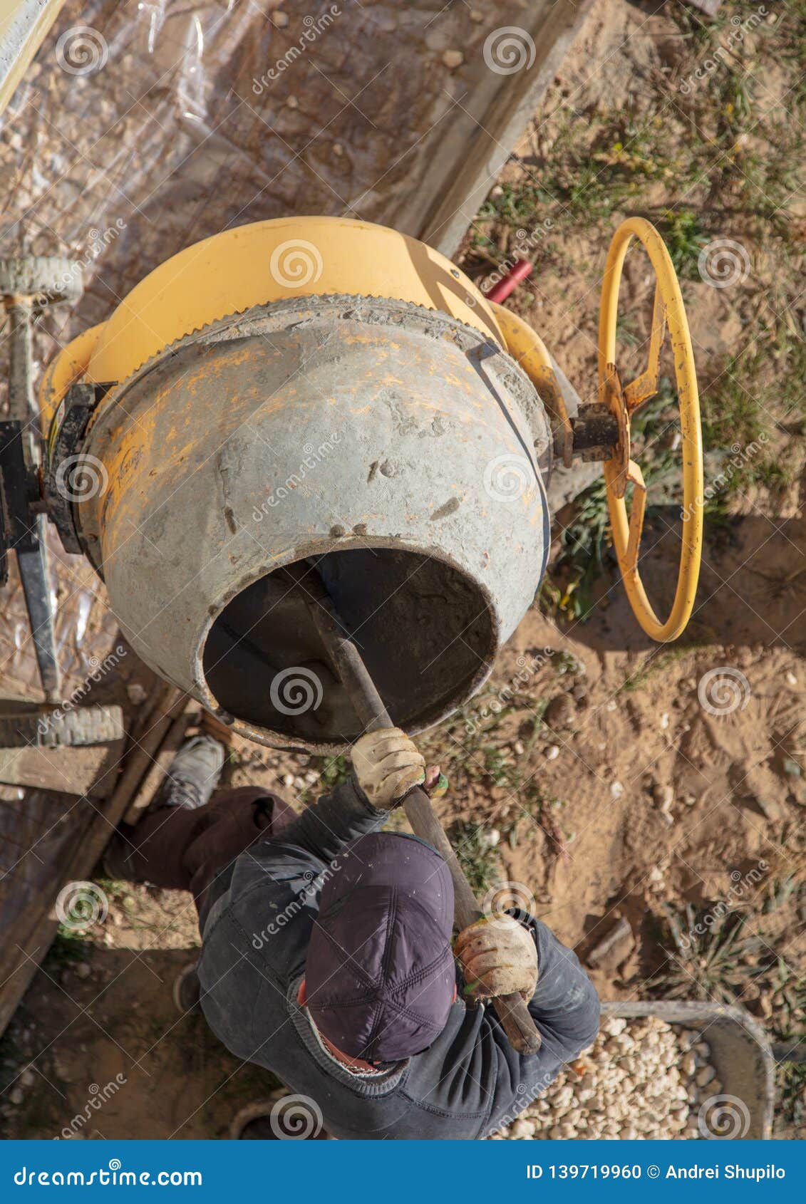 Workers Pour Concrete Solution at a Construction Site Stock Photo ...