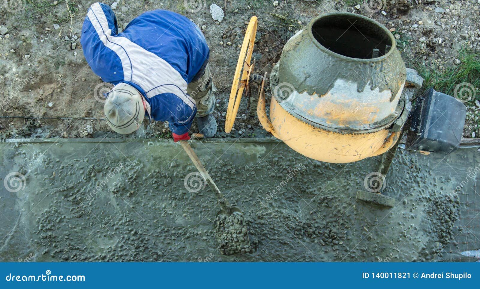 Workers Pour Concrete Solution at a Construction Site Stock Image ...