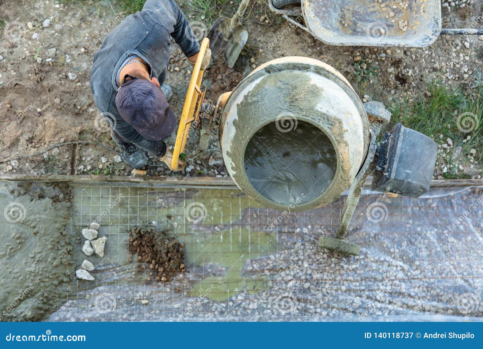 Workers Pour Concrete Solution at a Construction Site Editorial ...