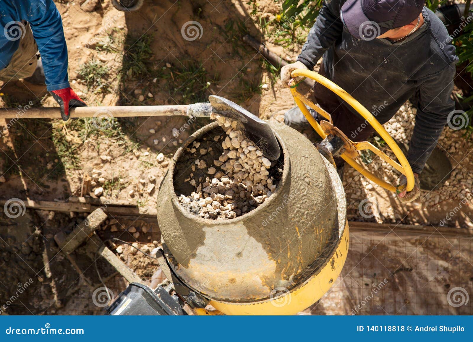 Workers Pour Concrete Solution at a Construction Site Editorial Stock ...