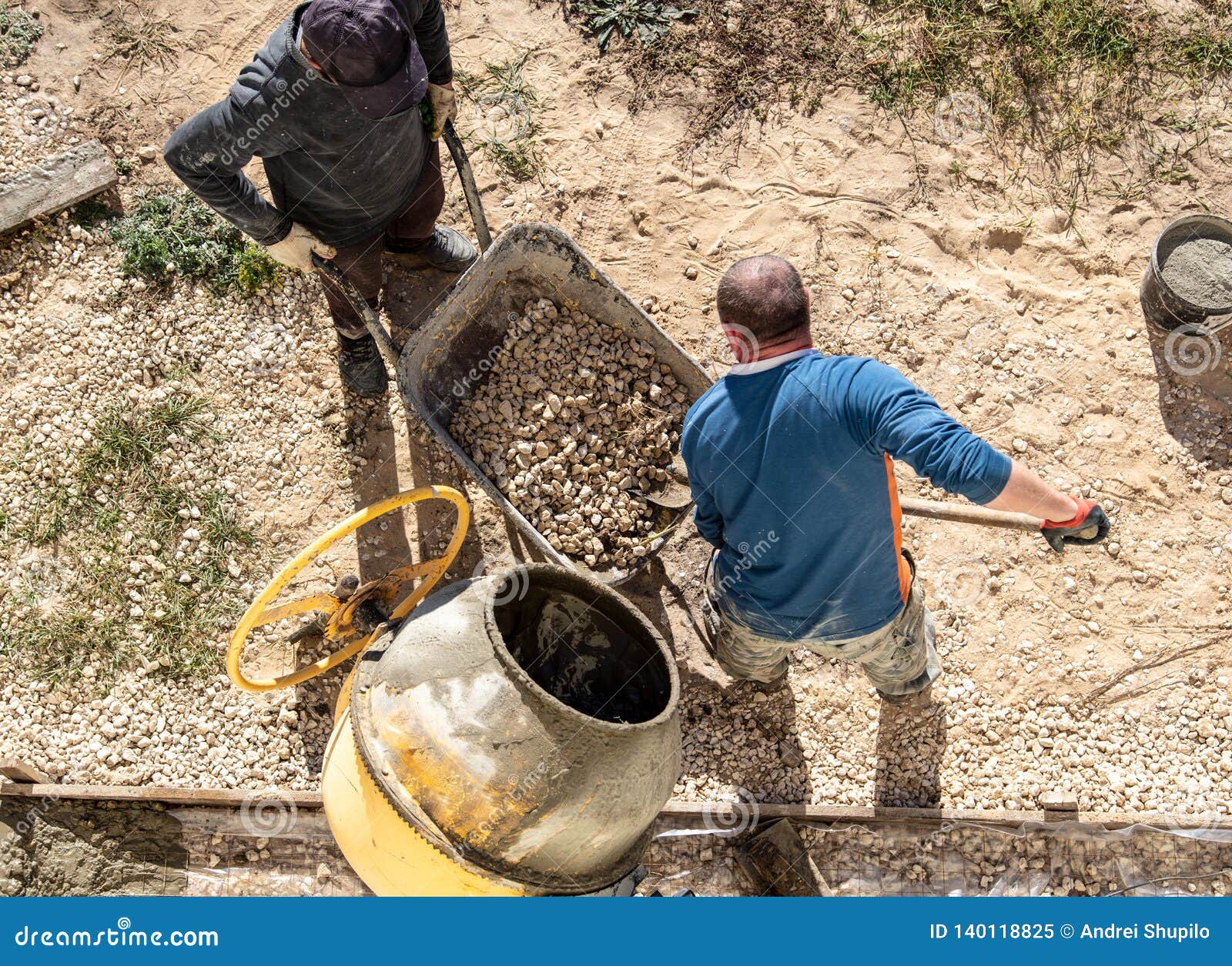 Workers Pour Concrete Solution at a Construction Site Editorial Image ...