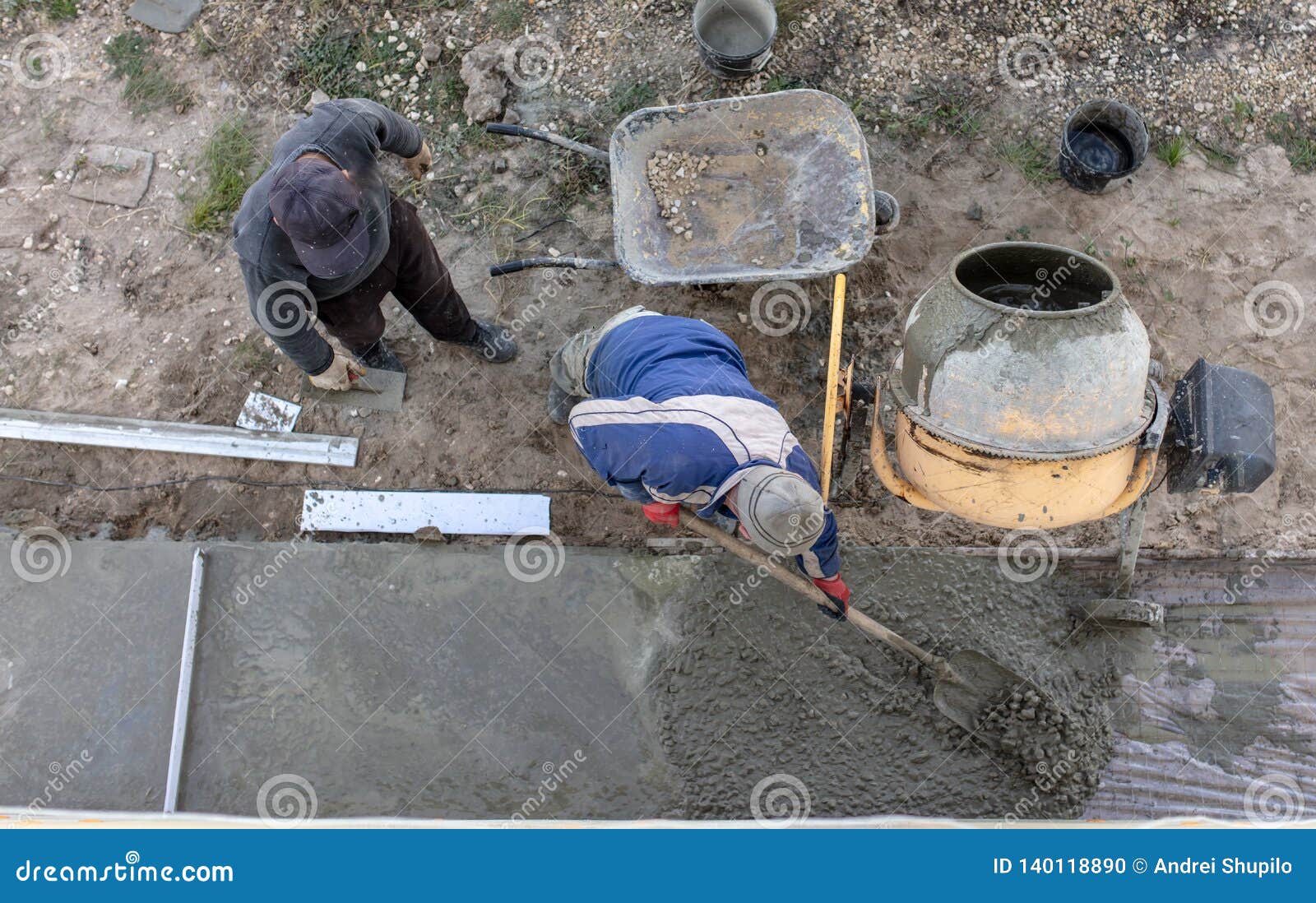 Workers Pour Concrete Solution at a Construction Site Editorial Image ...