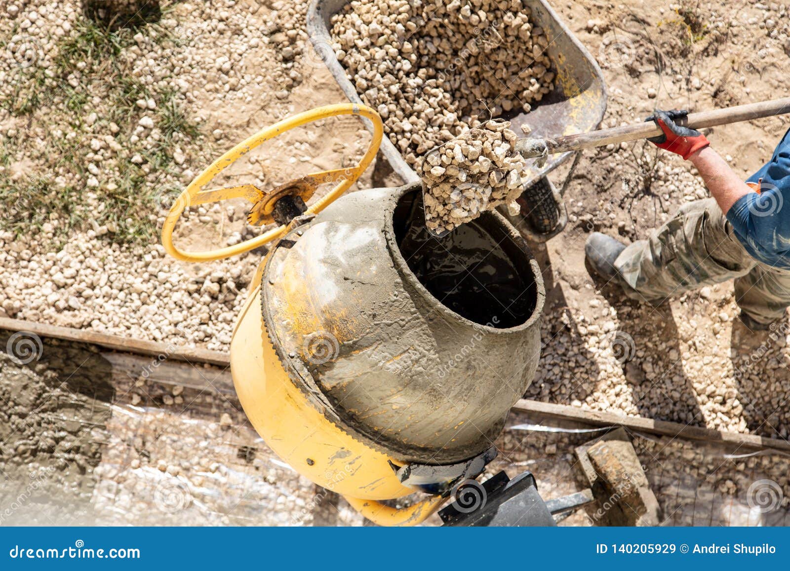 Workers Pour Concrete Solution at a Construction Site Stock Image ...